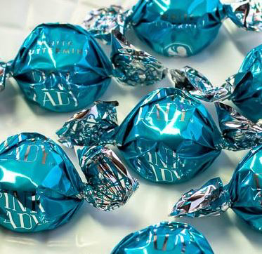 Pink Lady White Buttermint Chocolates in 1kg Bag_. Wallies Lollies